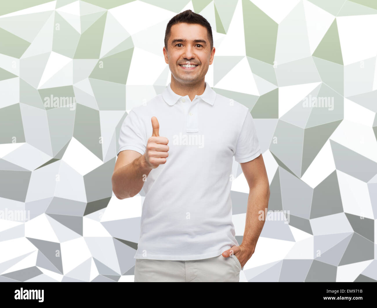 smiling man showing thumbs up Stock Photo - Alamy