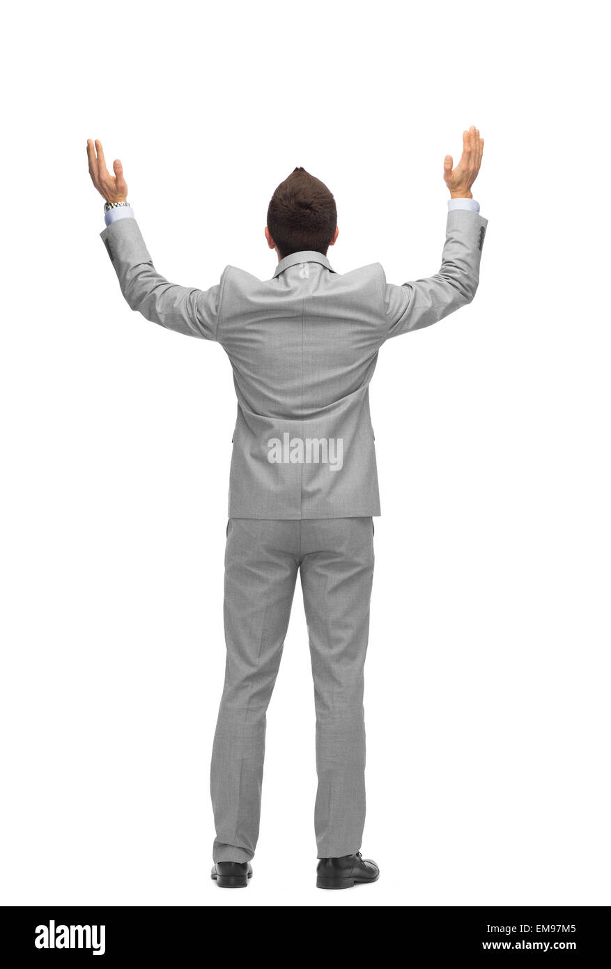 businessman raising hands up from back Stock Photo - Alamy
