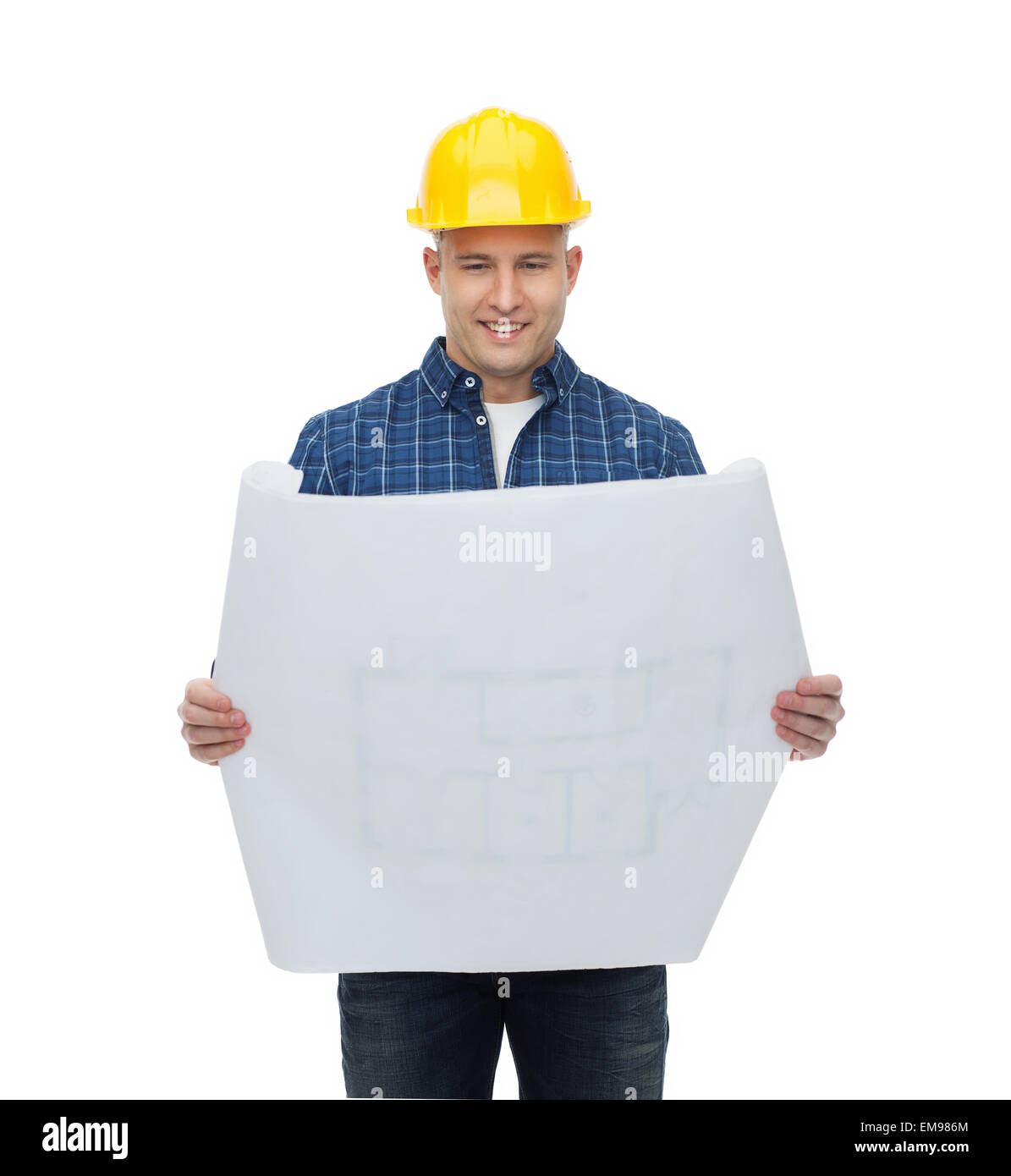 Young man looking blueprint layout Cut Out Stock Images & Pictures - Alamy