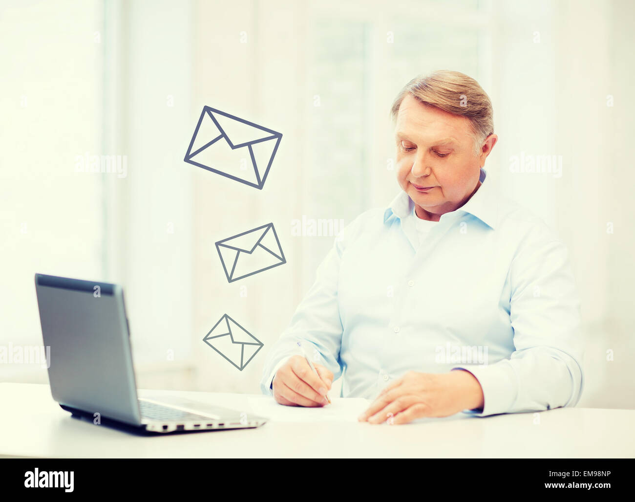 Old man writing email hi-res stock photography and images - Alamy