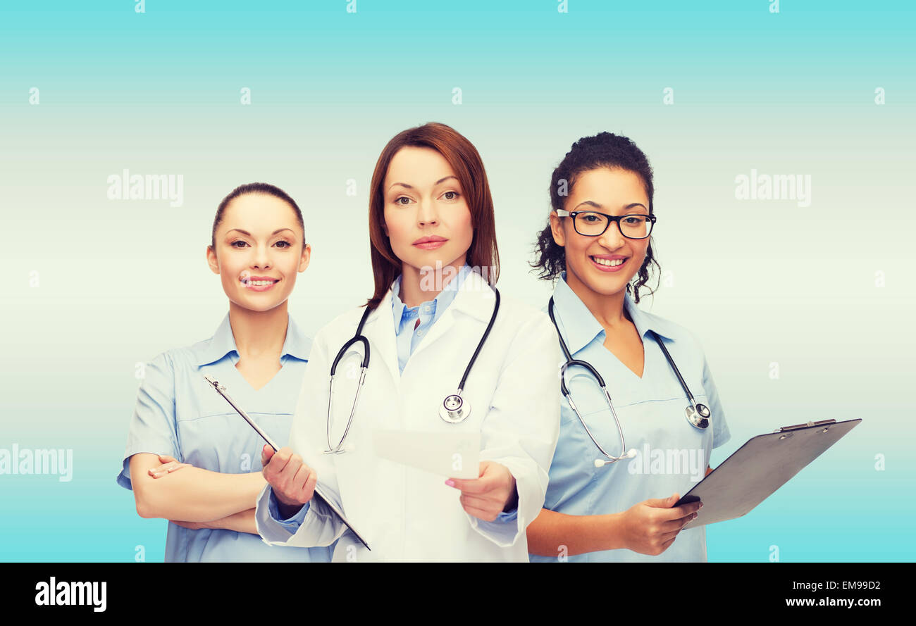 calm female doctor with clipboard Stock Photo - Alamy