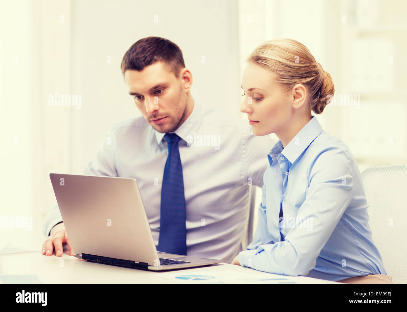 business team working with laptop in office Stock Photo - Alamy