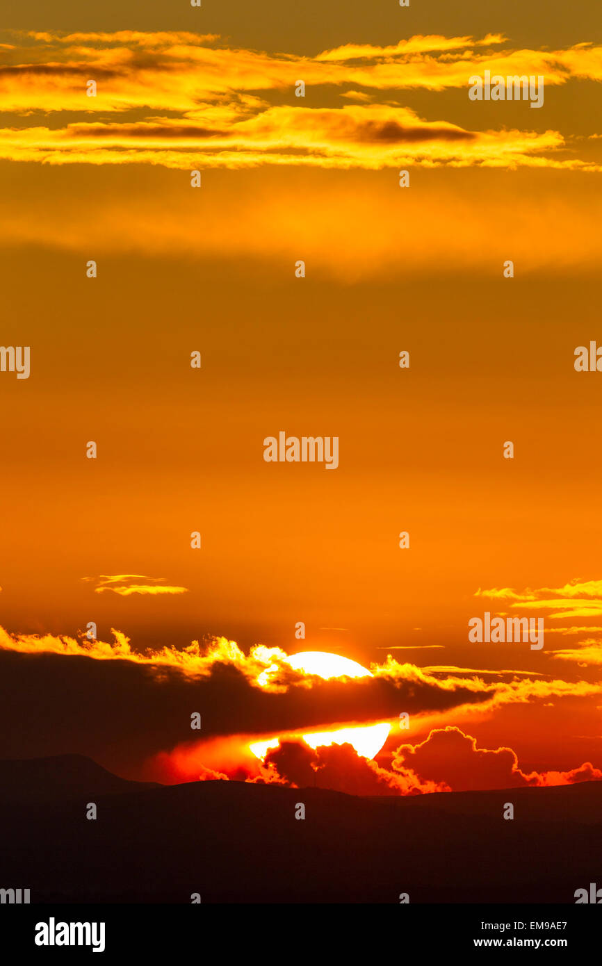 Stunning image of sunset behind clouds taken from Malvern HIlls overlooking Hay Bluff Brecon ...