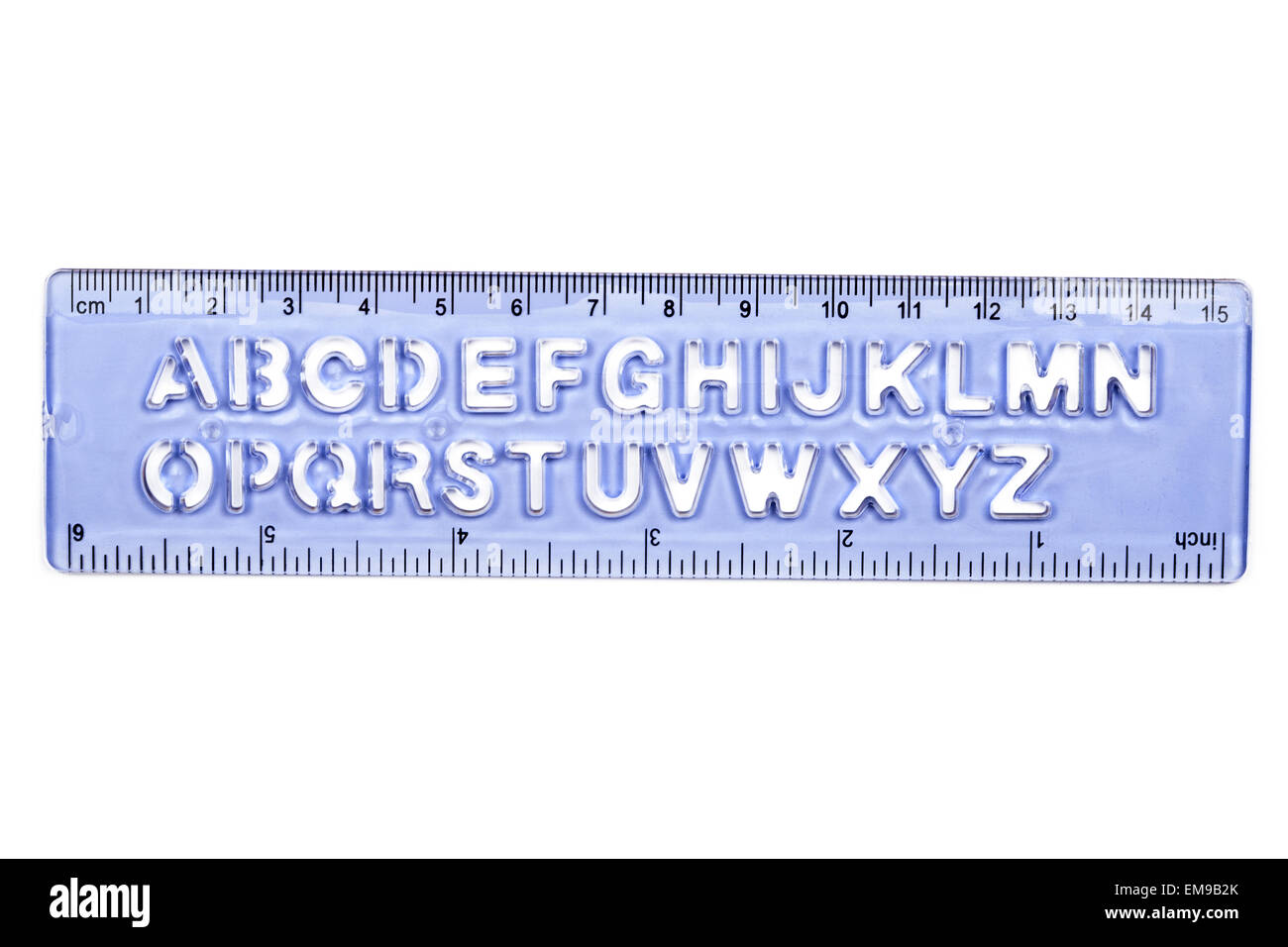 Blue plastic ruler and stencil isolated on white Stock Photo - Alamy