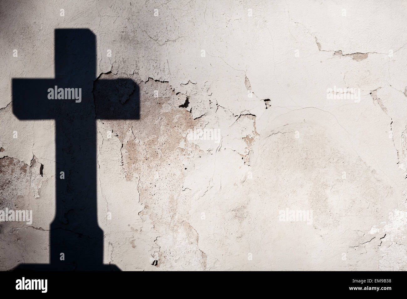 Shadow of a cross on a wall Stock Photo - Alamy