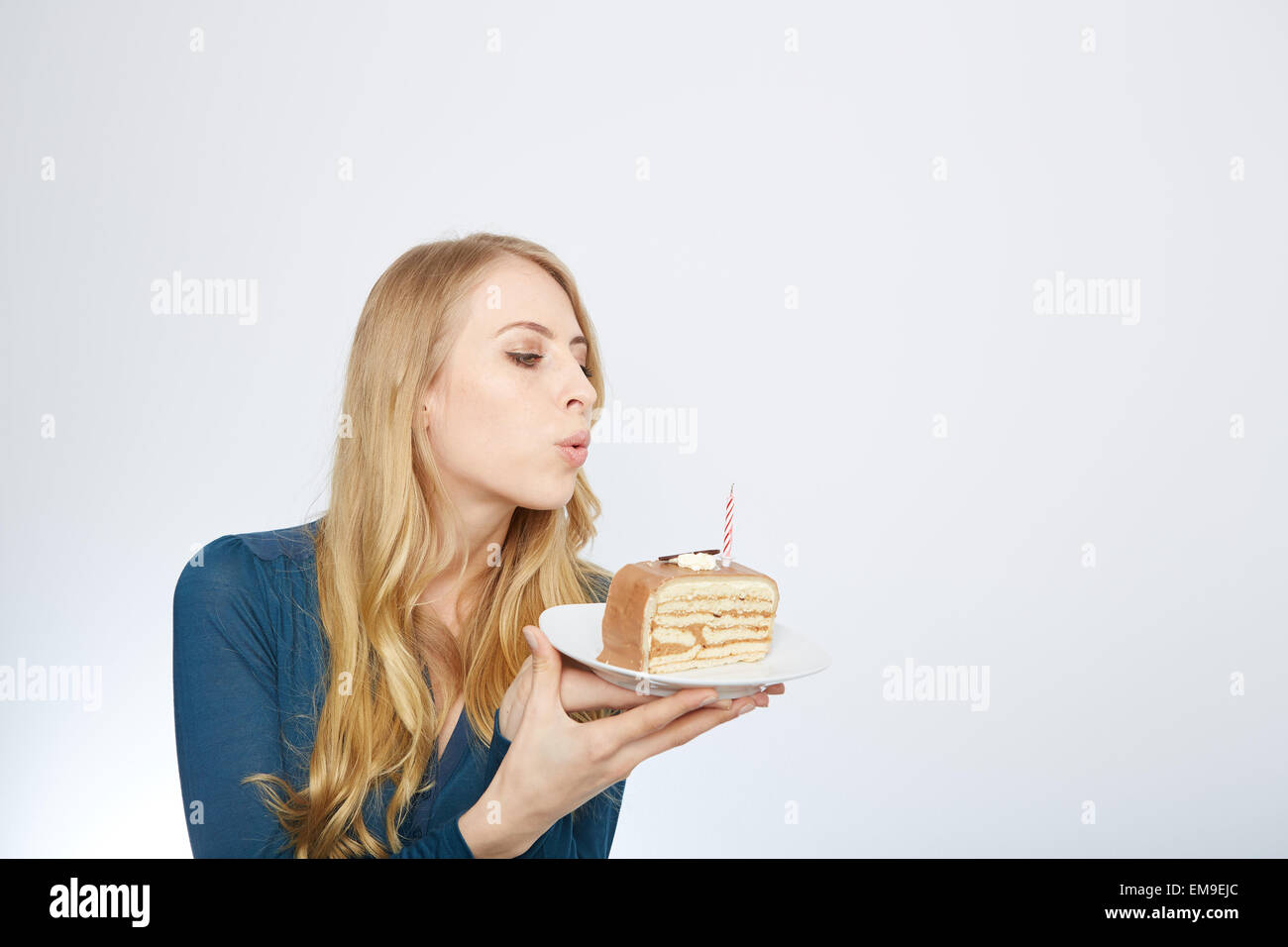 Fat woman eating cake hi-res stock photography and images - Alamy