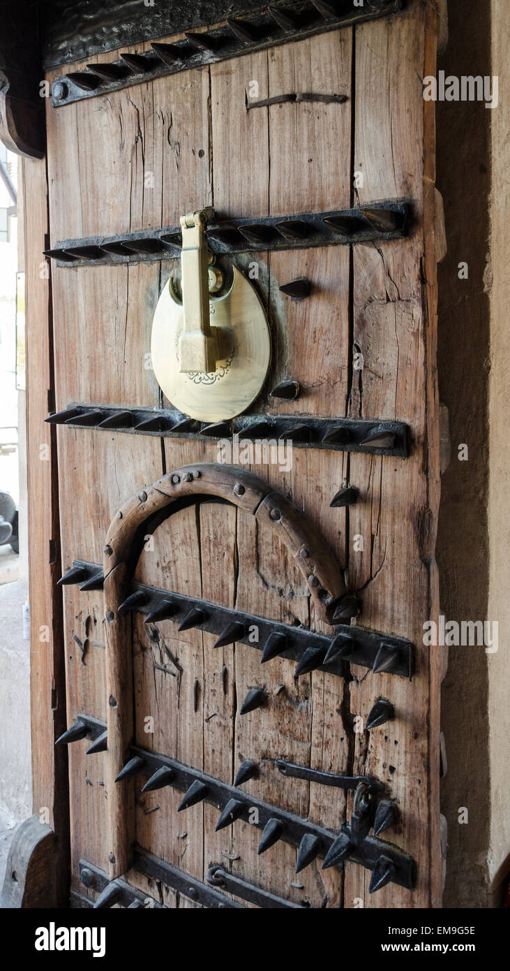 Detail of wood and metal old door with sharp spikes, Dubai, UAE Stock ...