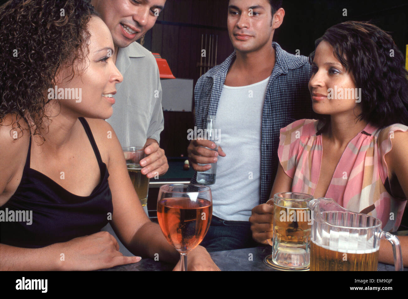 Couples out socializing hi-res stock photography and images - Alamy