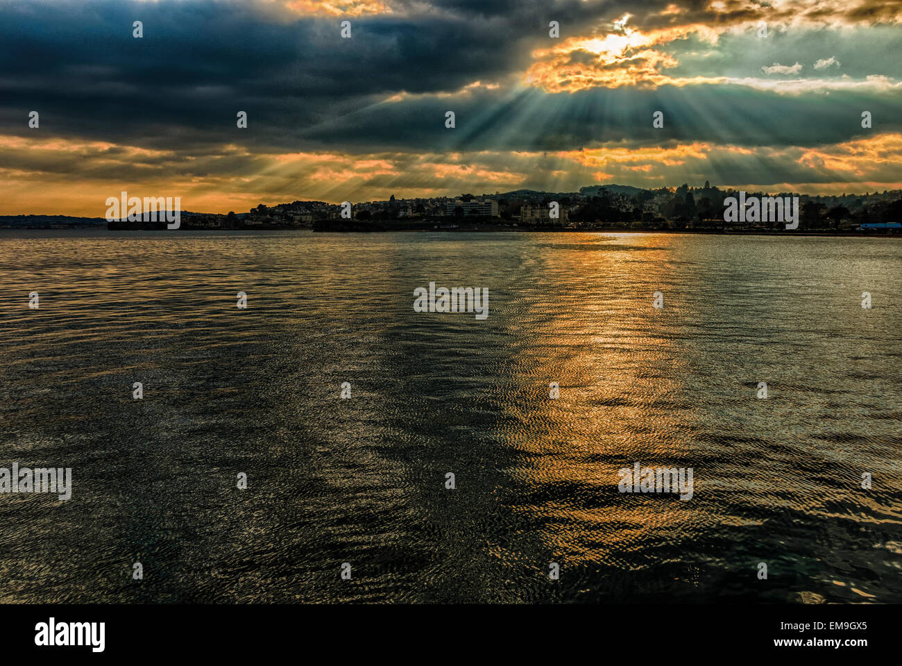 Ray of light over Torquay Stock Photo - Alamy