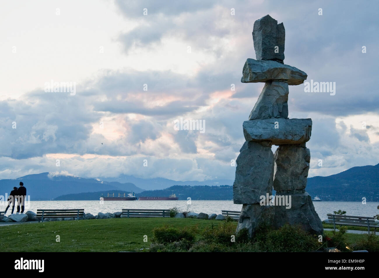Inukshuk In English Bay At Dusk, Vancouver, British Columbia, Canada ...