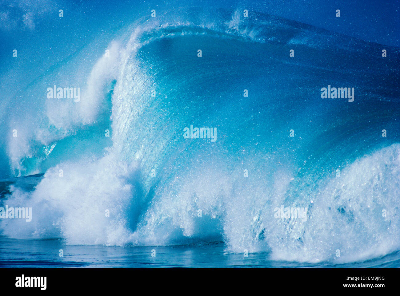 Hawaii, Wave Crashing With Spray Stock Photo - Alamy