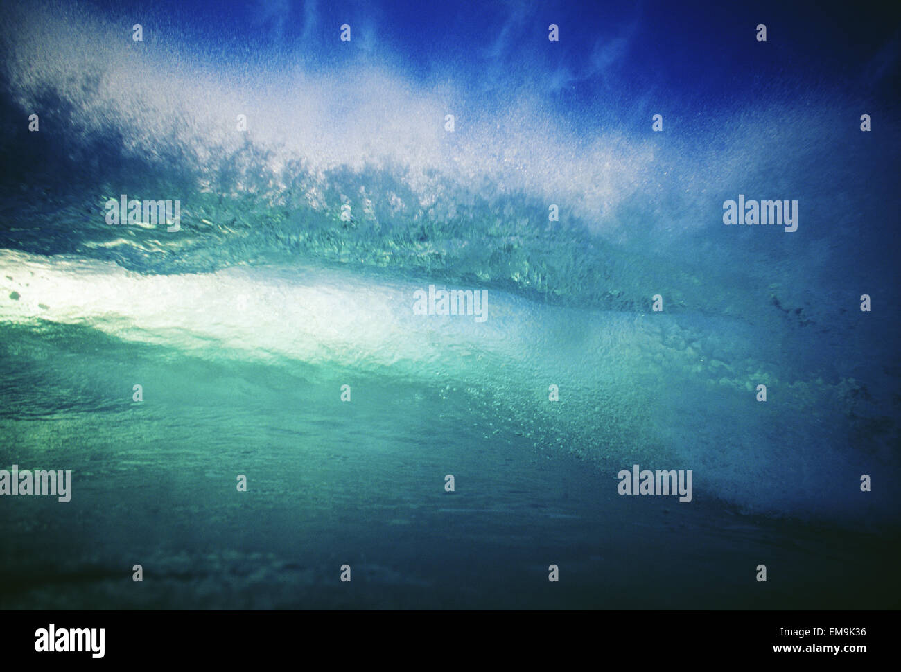 Clear Blue Wave Curling Over, View From Front Of Wave With Whitewash ...