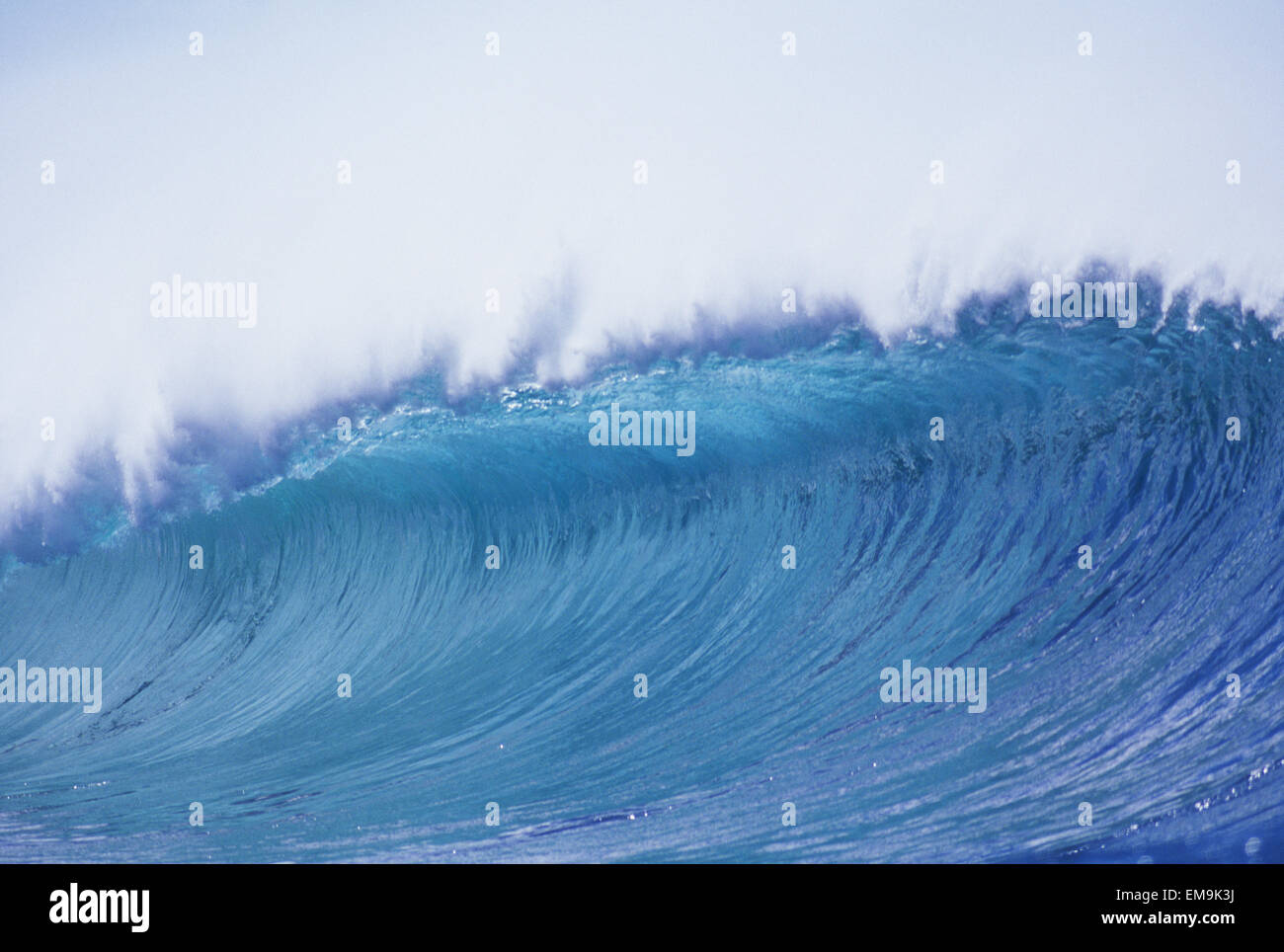 Blue Wave Curling Over Stock Photo - Alamy