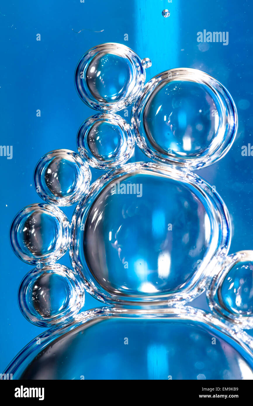 Blue bubbles in clear water Stock Photo - Alamy