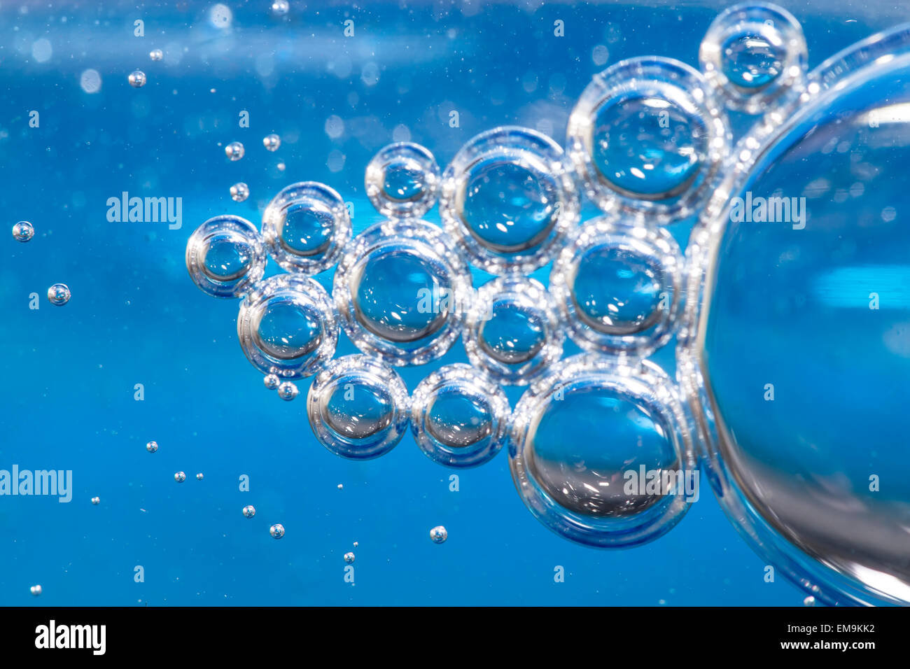 Blue bubbles in clear water Stock Photo - Alamy