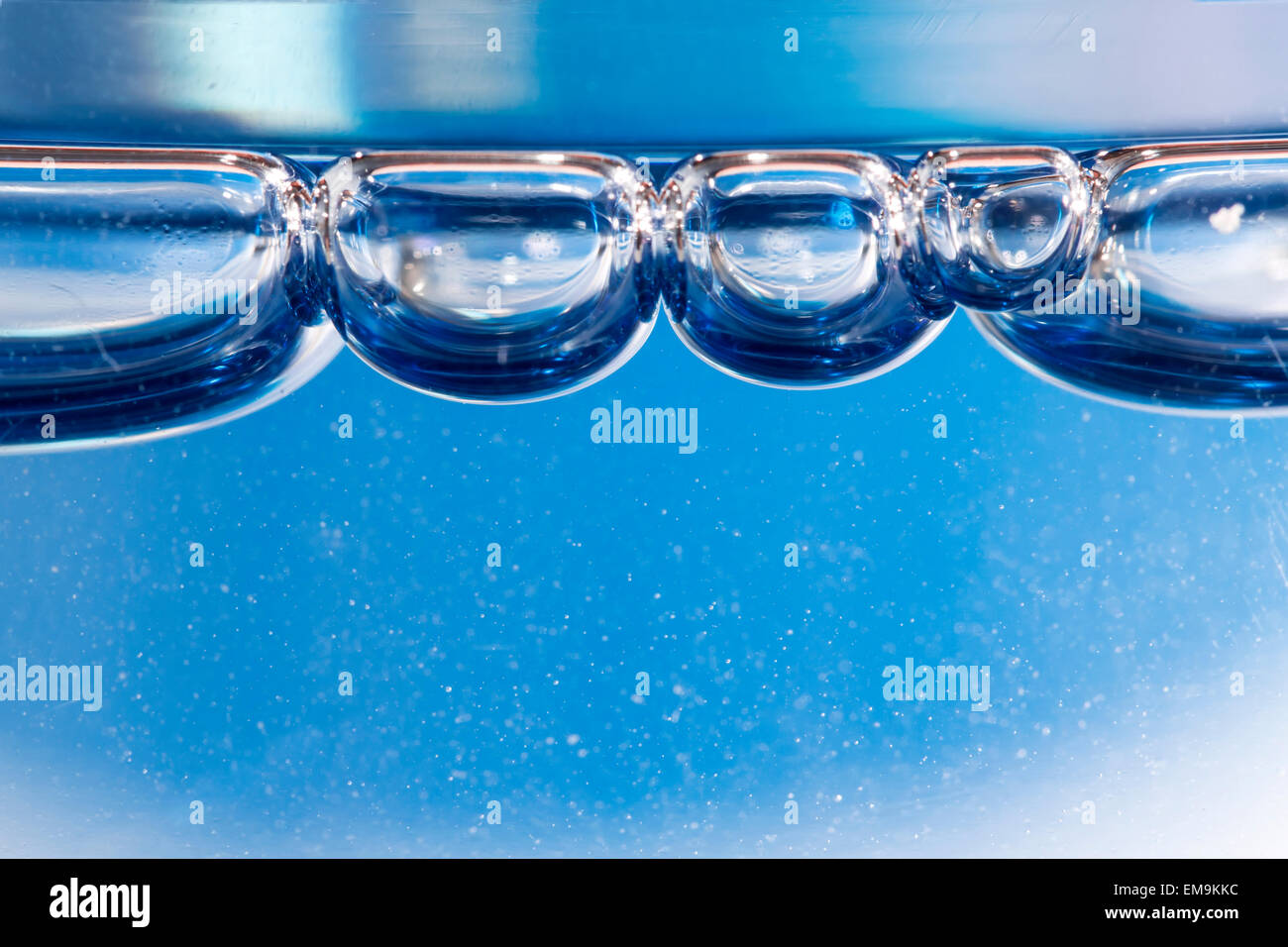 Blue bubbles in clear water Stock Photo - Alamy