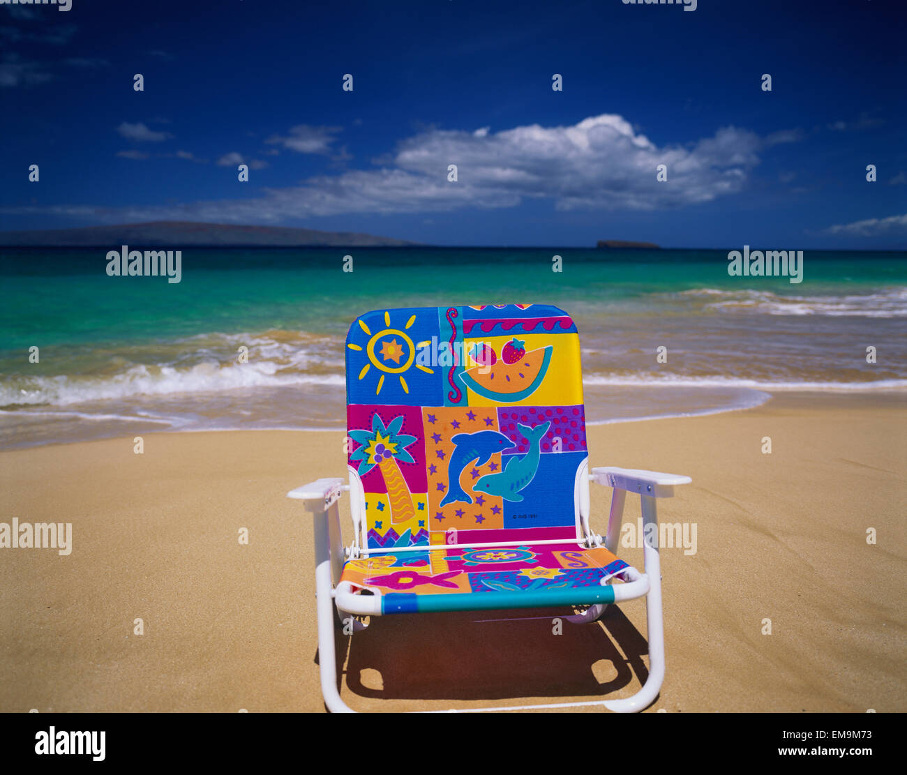 Hawaii, Maui, Makena State Park, Big Beach; Colorful Beach Chair On ...