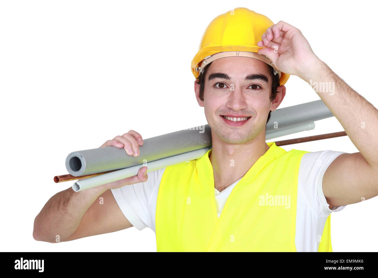 Carrying pipes on his shoulder Stock Photo - Alamy