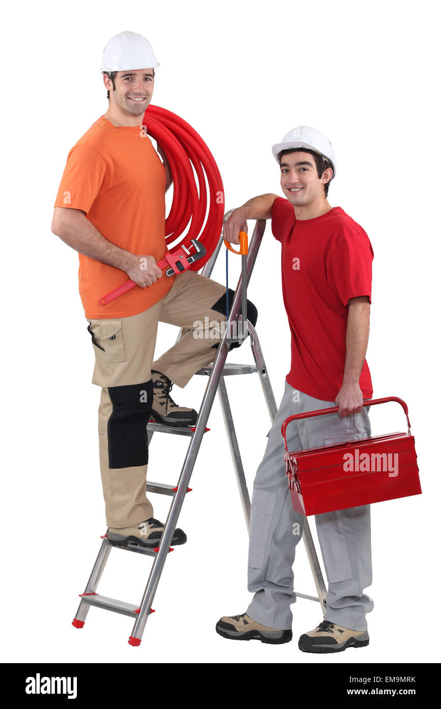 Portrait of a team of tradesmen Stock Photo - Alamy