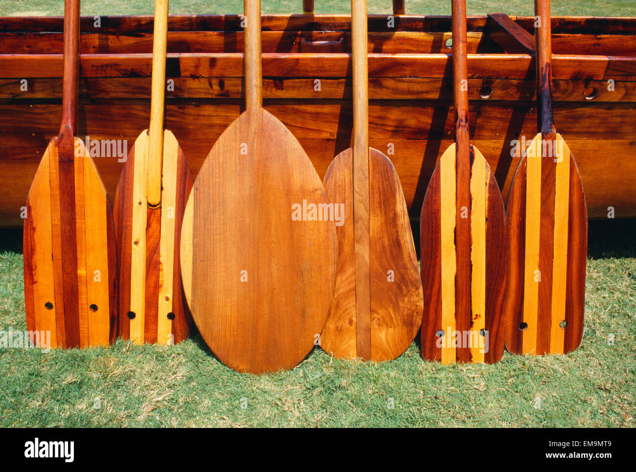 Hawaii, Different Shaped Canoe Paddles In Front Of Koa Canoe Stock ...