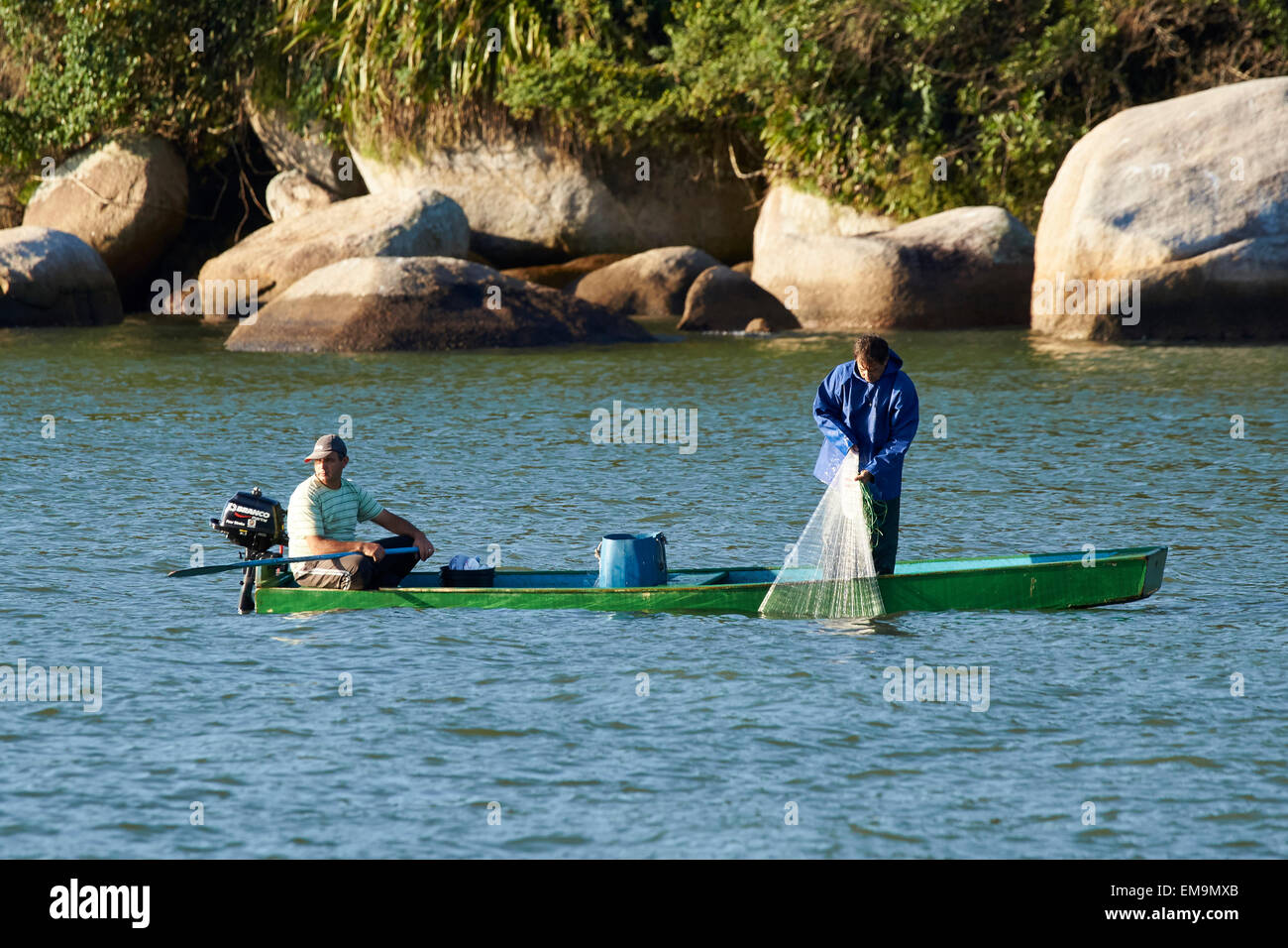 Fishing with a throw net Stock Photo - Alamy