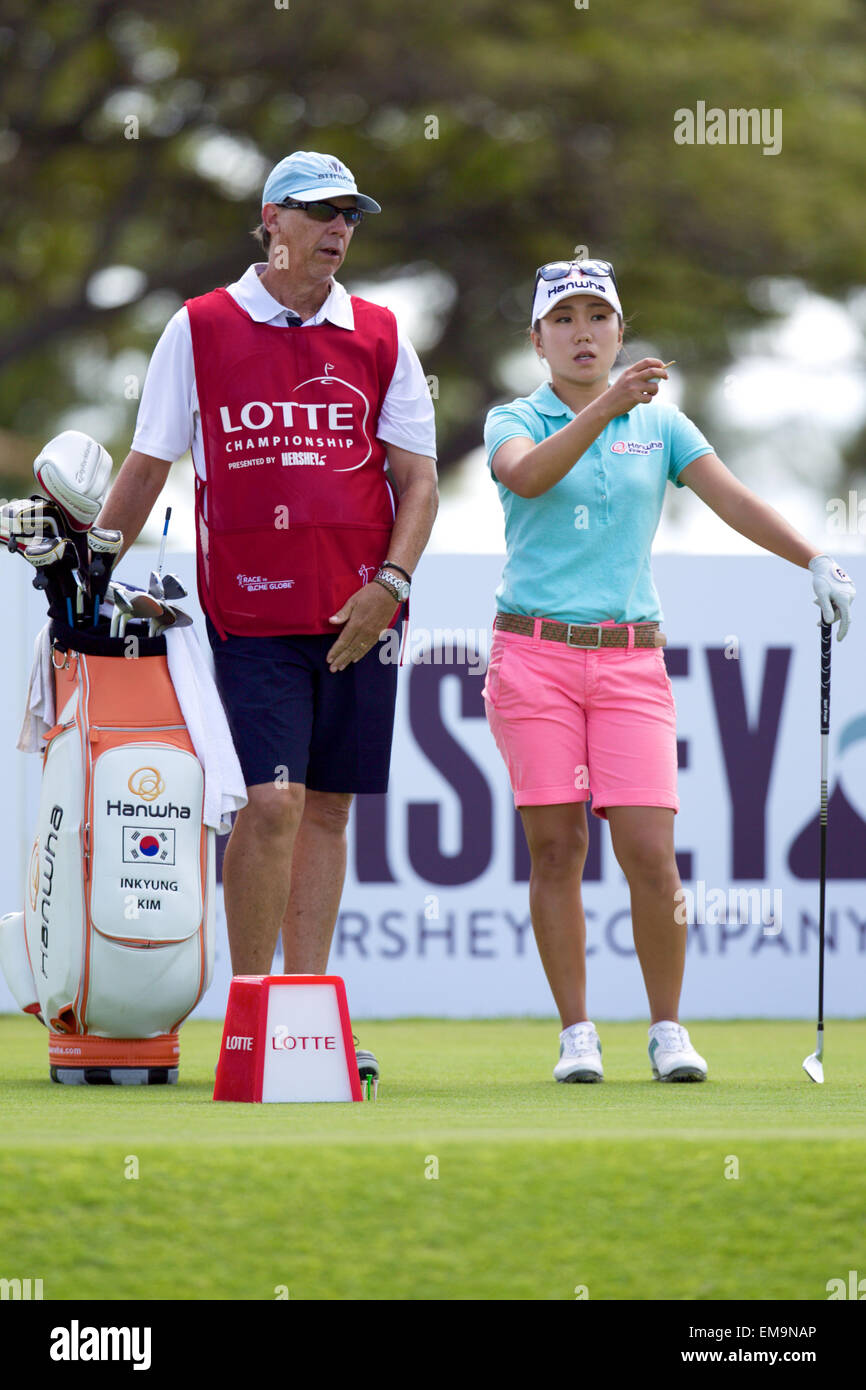 April 15, 2015 - I.K. Kim discusses her next shot with her caddie ...