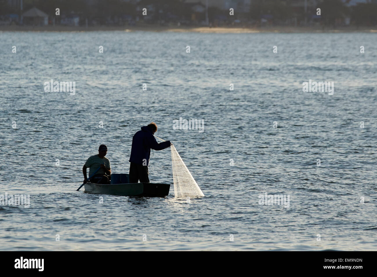 Fishing with a throw net Stock Photo - Alamy