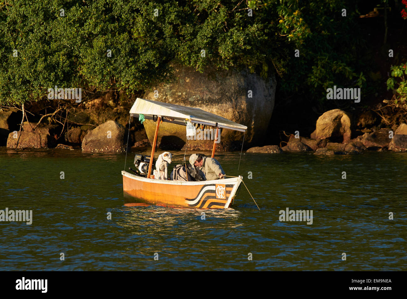 Fisherman with his best friend Stock Photo - Alamy