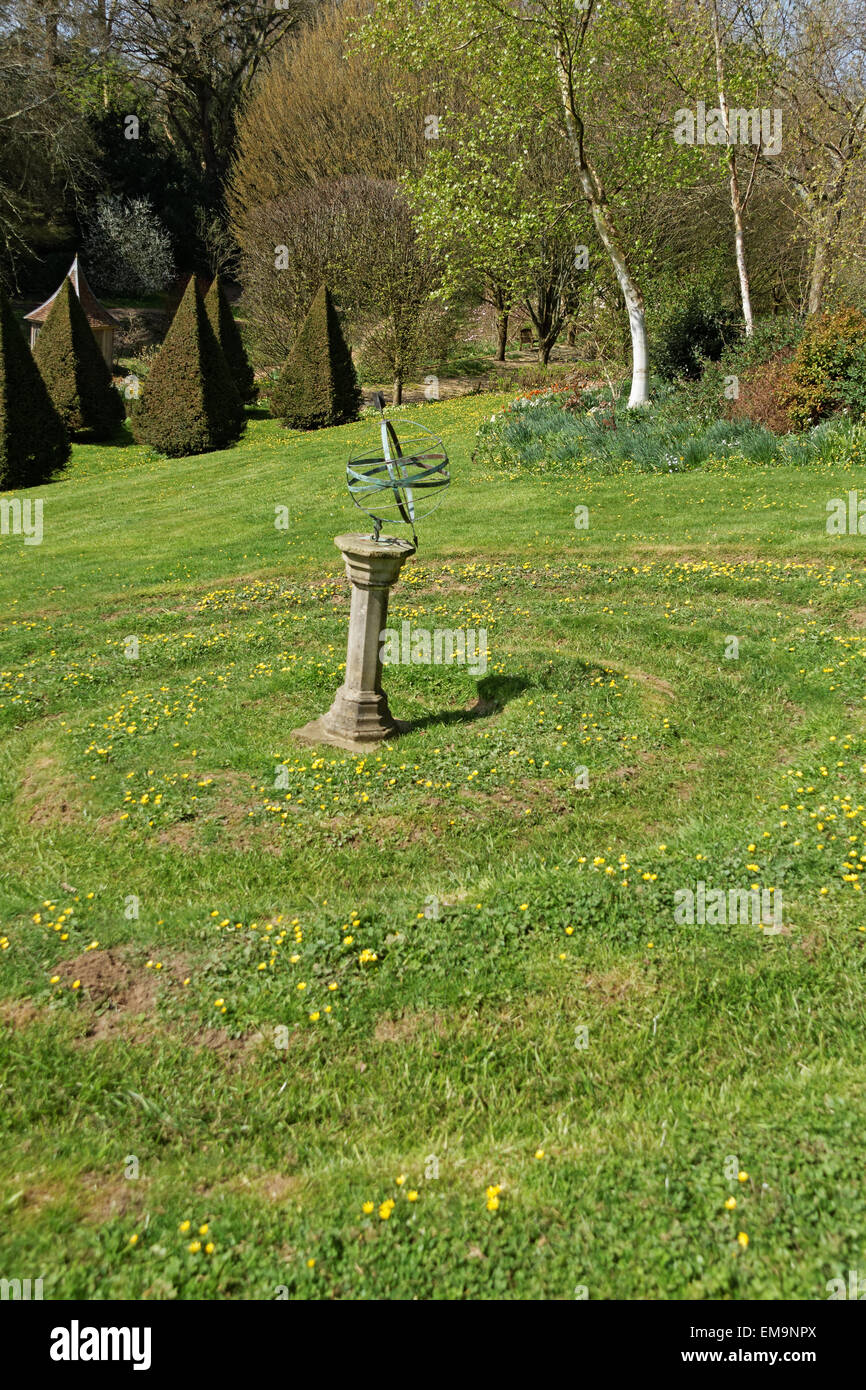 Trees with sun dial hi-res stock photography and images - Alamy