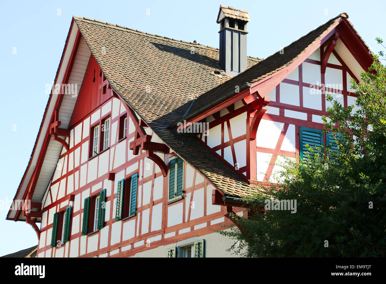 Swiss chalet with window shutters Stock Photo - Alamy