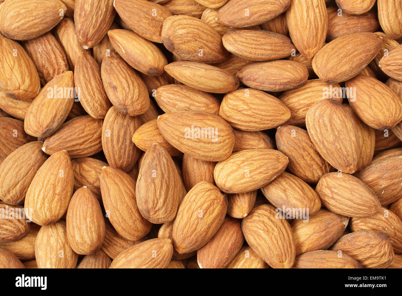 Food background - big shelled almonds situated arbitrarily Stock Photo ...