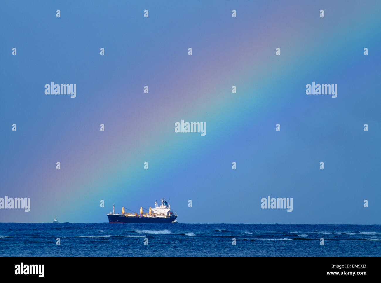Ocean Tanker Out At Sea With Rainbow Stock Photo - Alamy