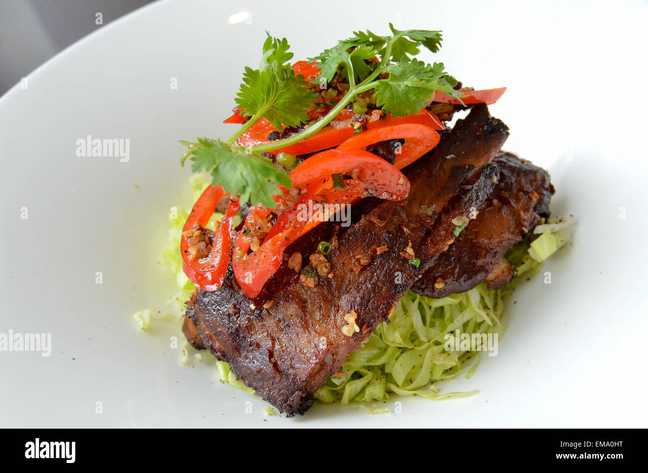Modern dish of BBQ Spare Ribs Stock Photo - Alamy