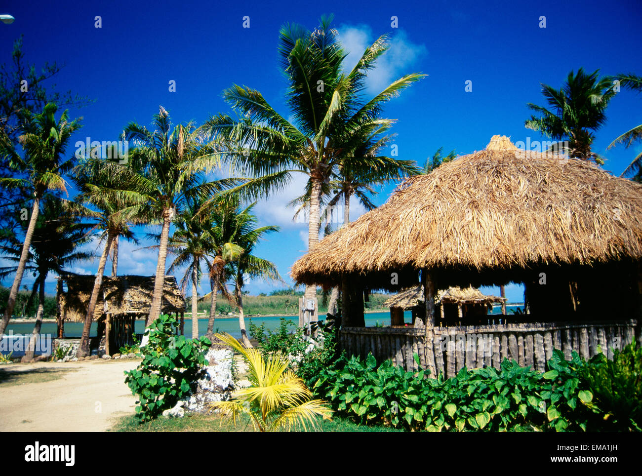 Guam, Inajaran, Cultural Village With Grass Huts Along Beach, Greenery ...