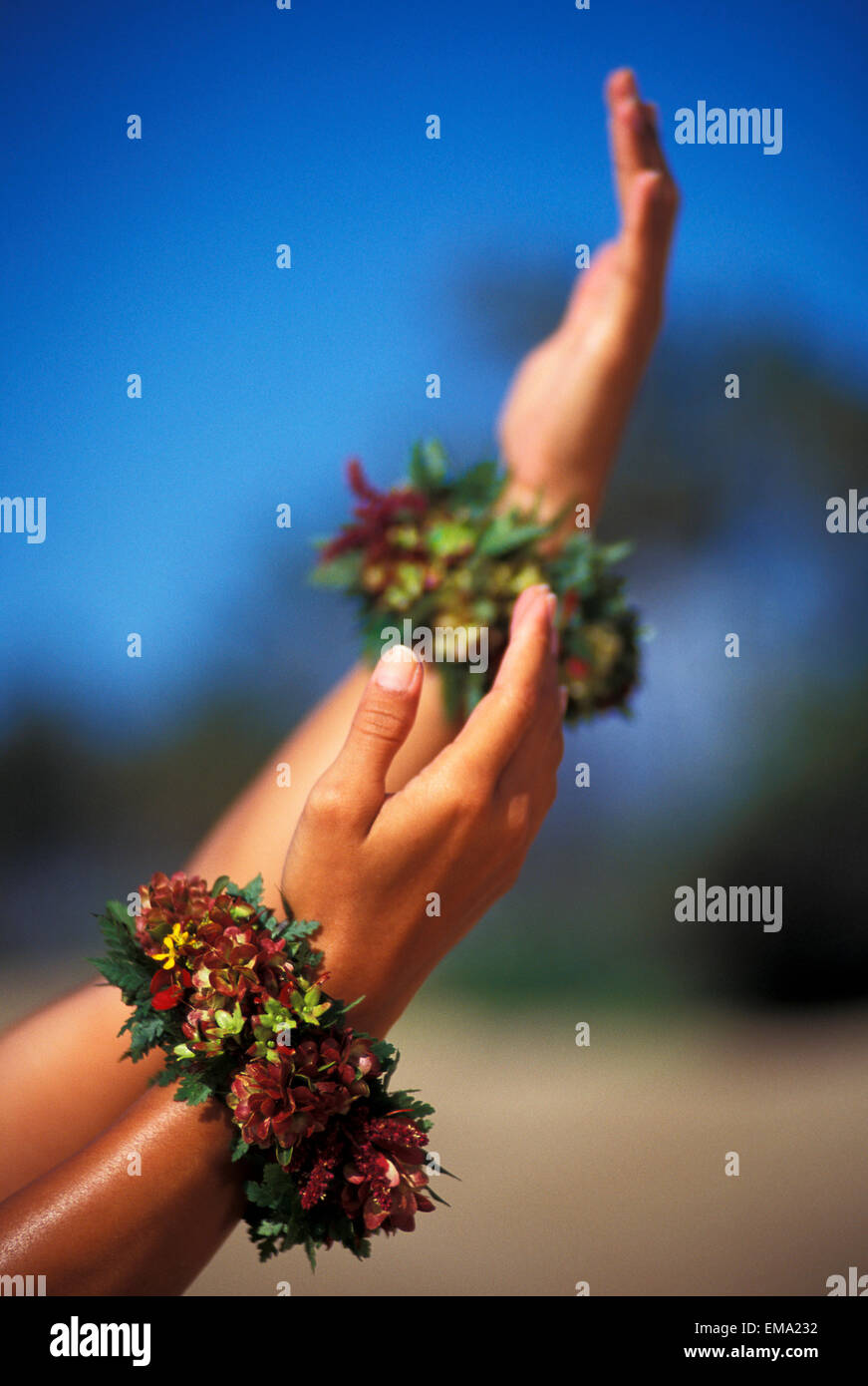 Close-Up Of Hula Hands With Flower Bracelets Stock Photo - Alamy