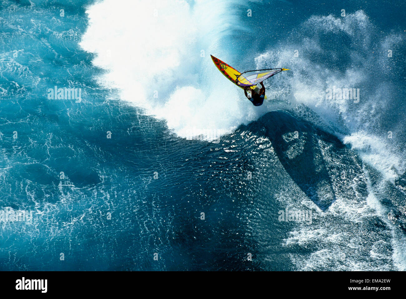 Hawaii, Aerial View Of Dave Kalama Flying Over Curling Wave Stock Photo ...