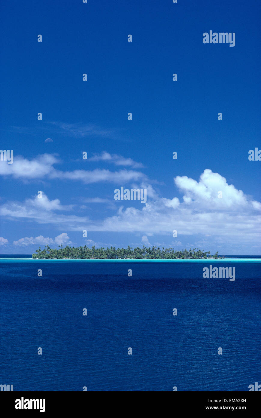 French Polynesia, Tahiti, Small Island (Motu) In Distance Palms Clouds, Calm Ocean A58F Stock ...
