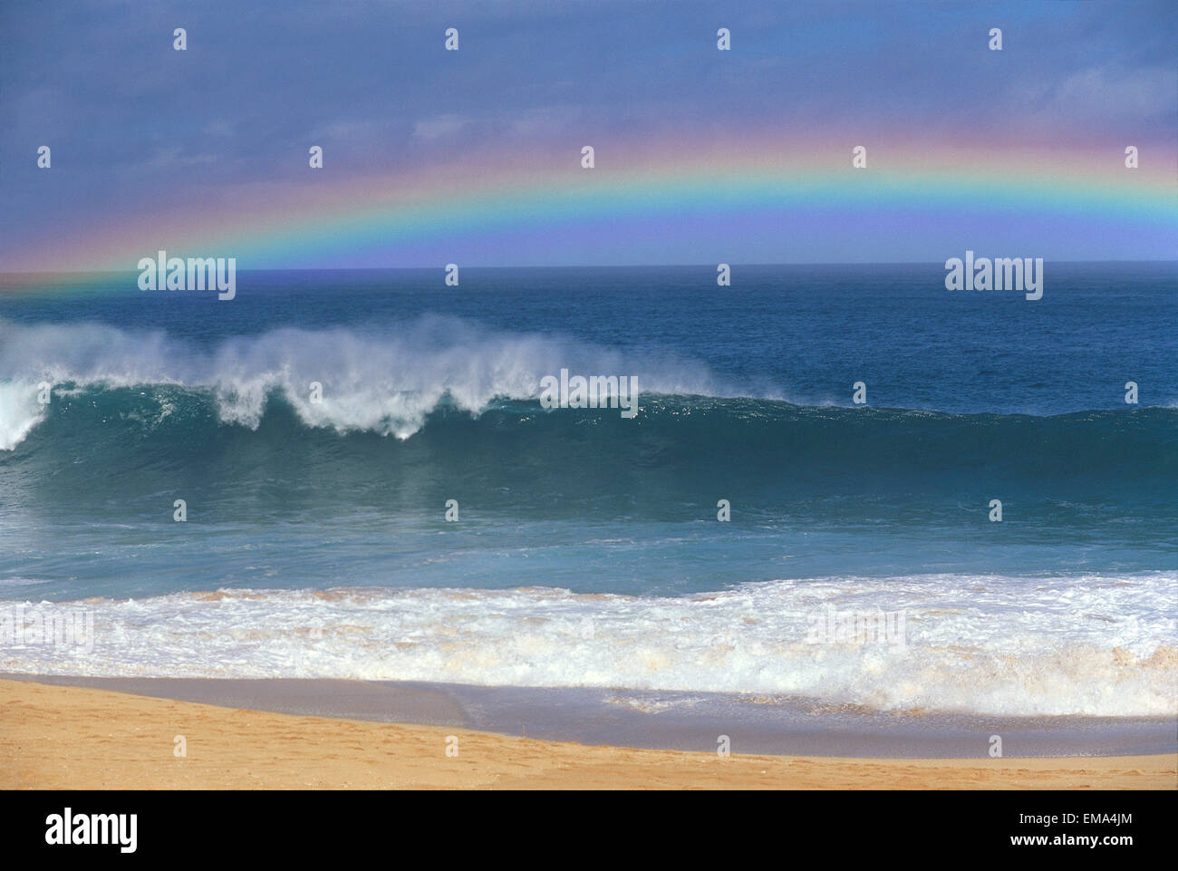 Rainbow Over Shore Break Beach Foreground, Horizon And Blue Sky With ...