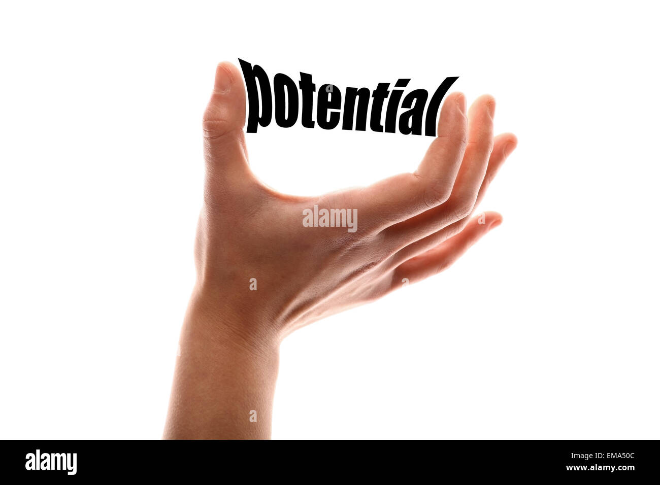 Color horizontal shot of a of a hand squeezing the word "potential ...