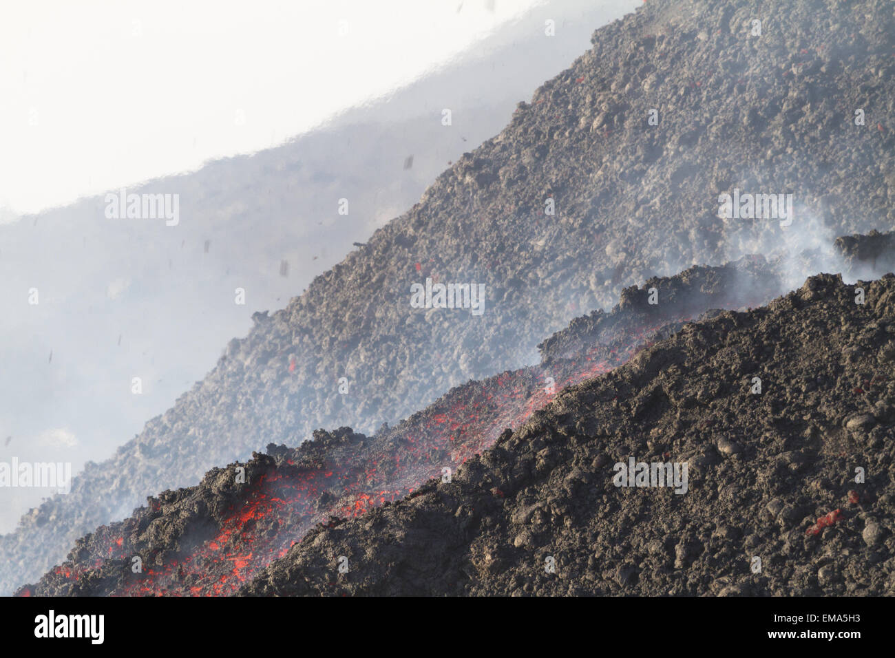 Volcano erupting lava flowing hi-res stock photography and images - Alamy