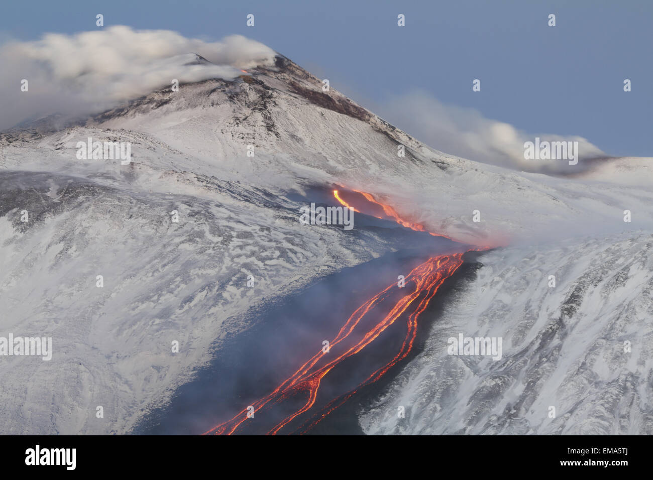 Volcano Eruption with snow Stock Photo - Alamy