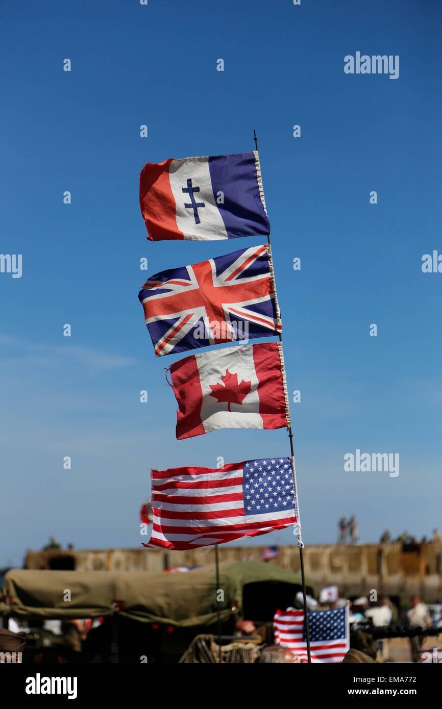 Four nations flags (France, United Kingdom, Canada, USA) fixed on a ...