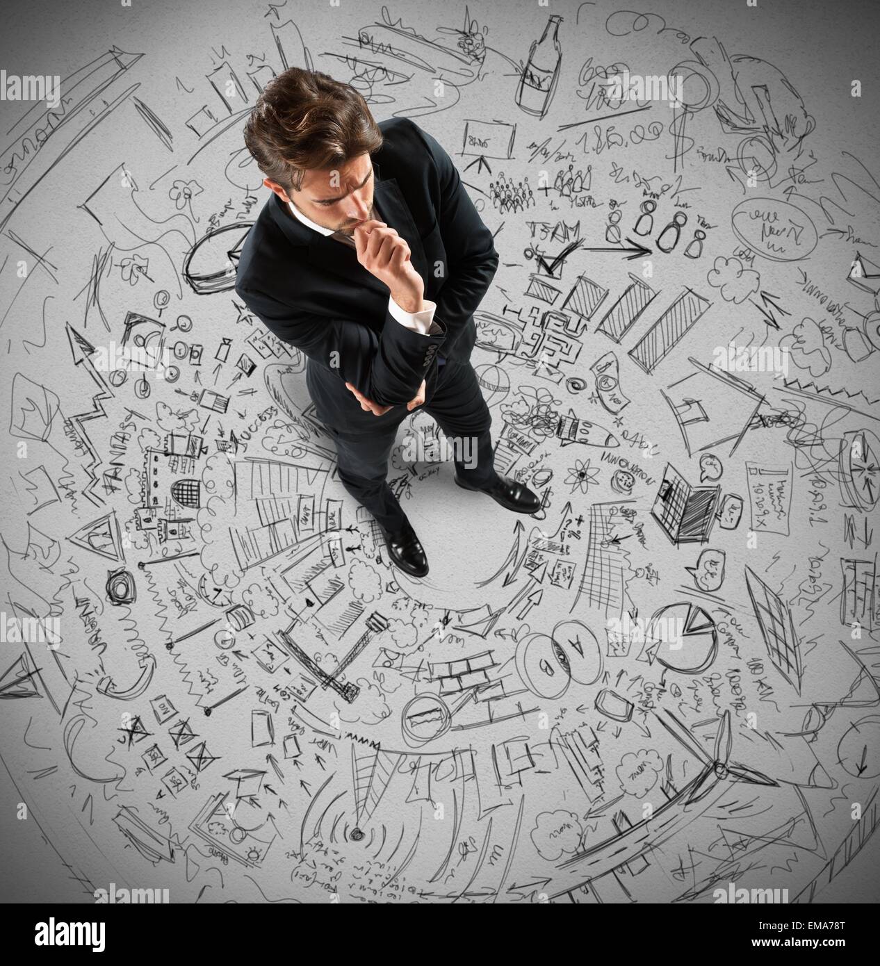 Businessman thinking projects Stock Photo - Alamy