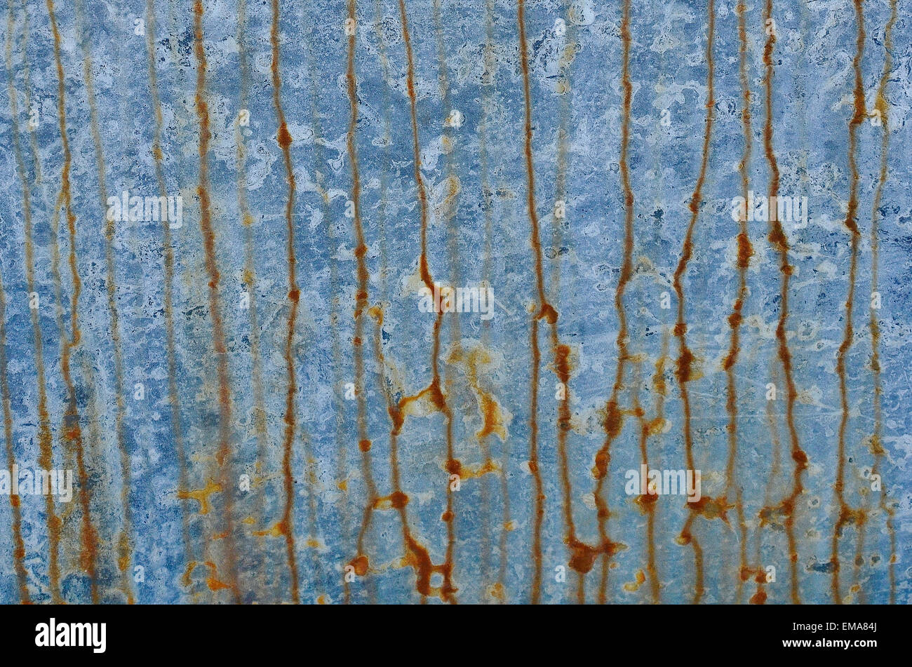 rust running down on blue painted steel door Stock Photo - Alamy