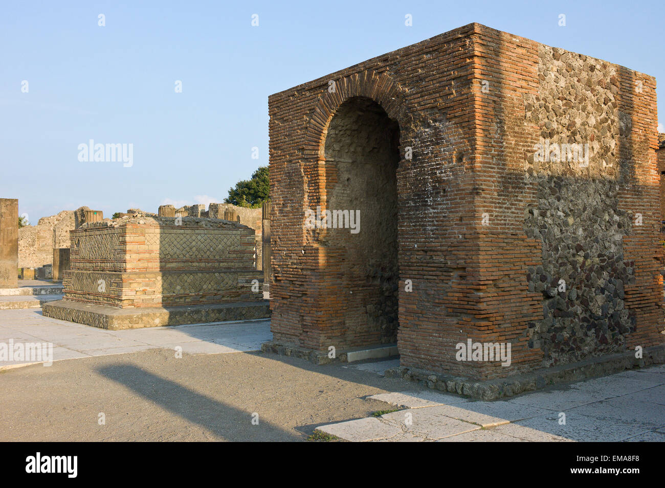 Pompeii, Italy. An arched monument on the south side of the Forum at the archaeological ...