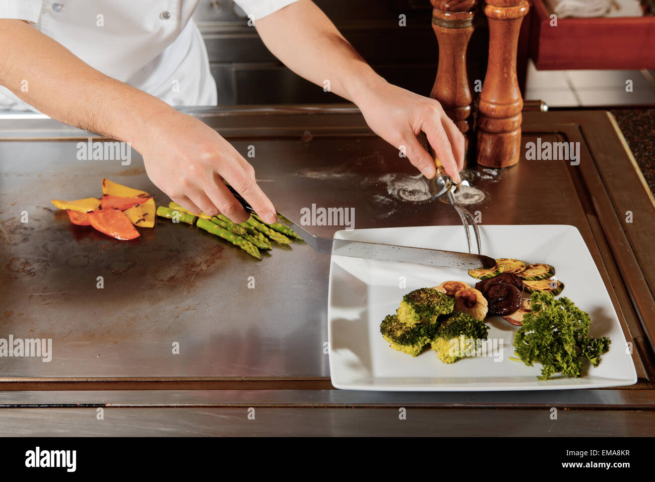 White uniform serves food hi-res stock photography and images - Alamy