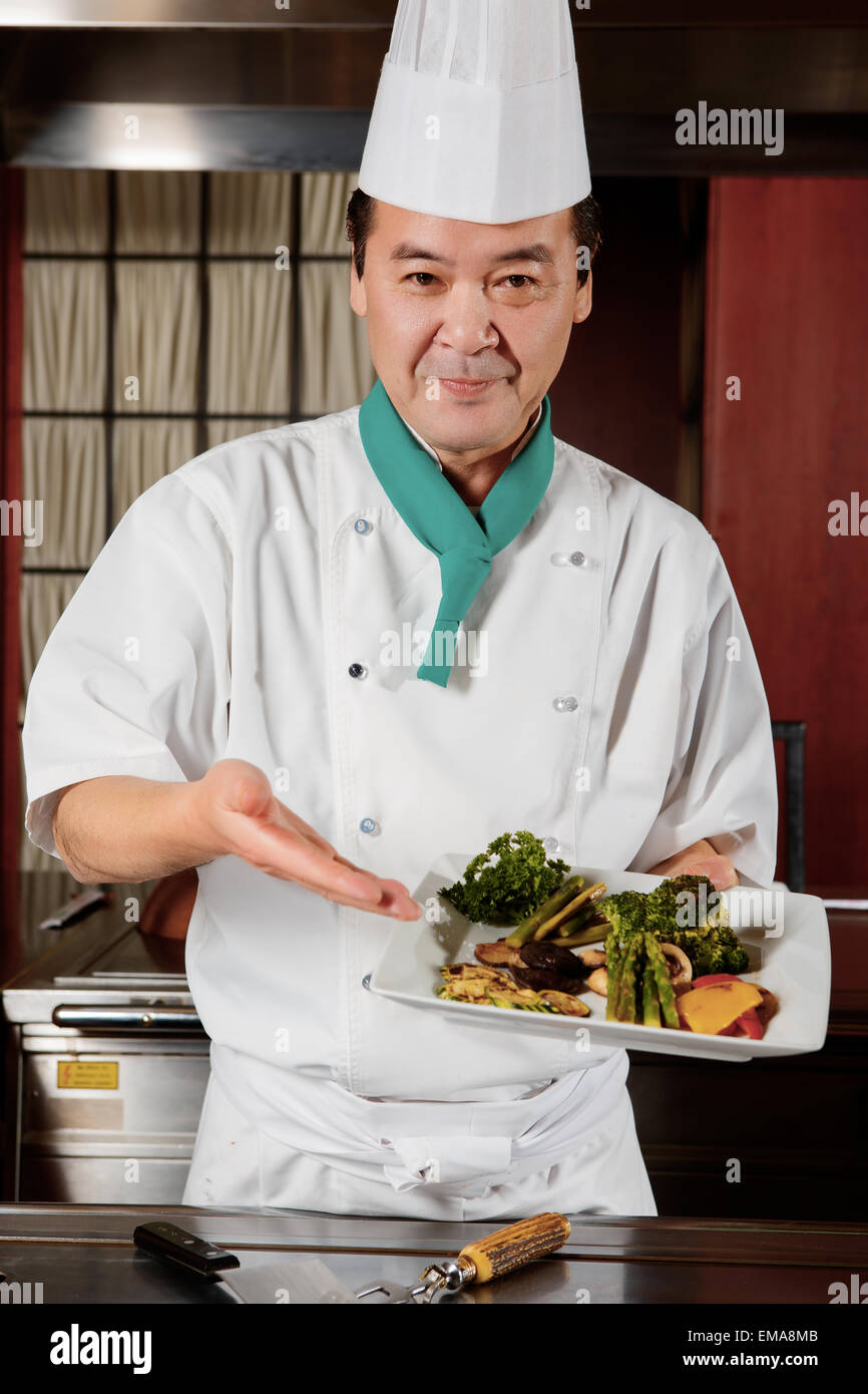 Cook demonstrates his dishes Stock Photo - Alamy Cook demonstrates his dishes Stock Photo - Alamy
