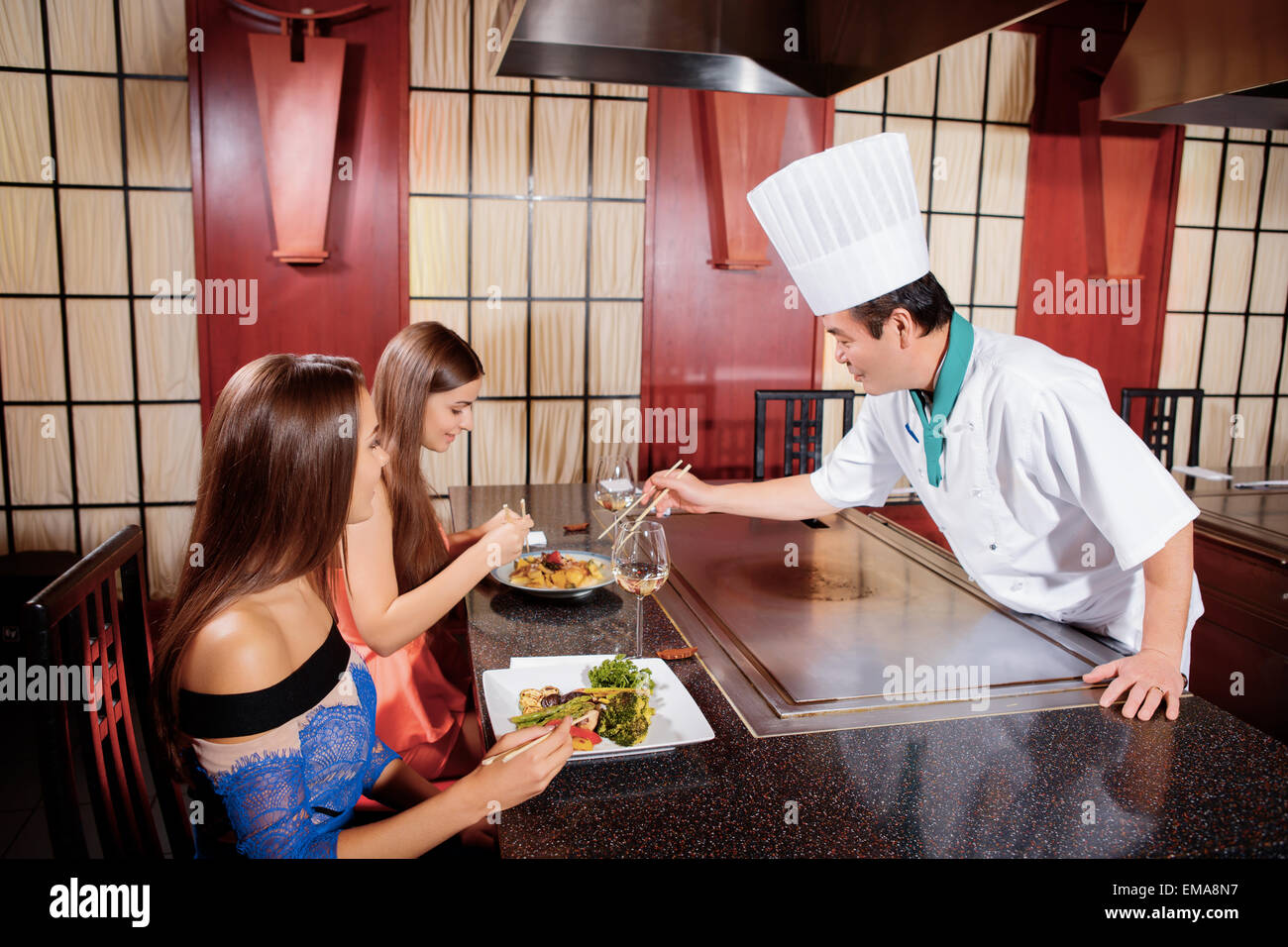 Female clients in Japanese restaurant Stock Photo - Alamy