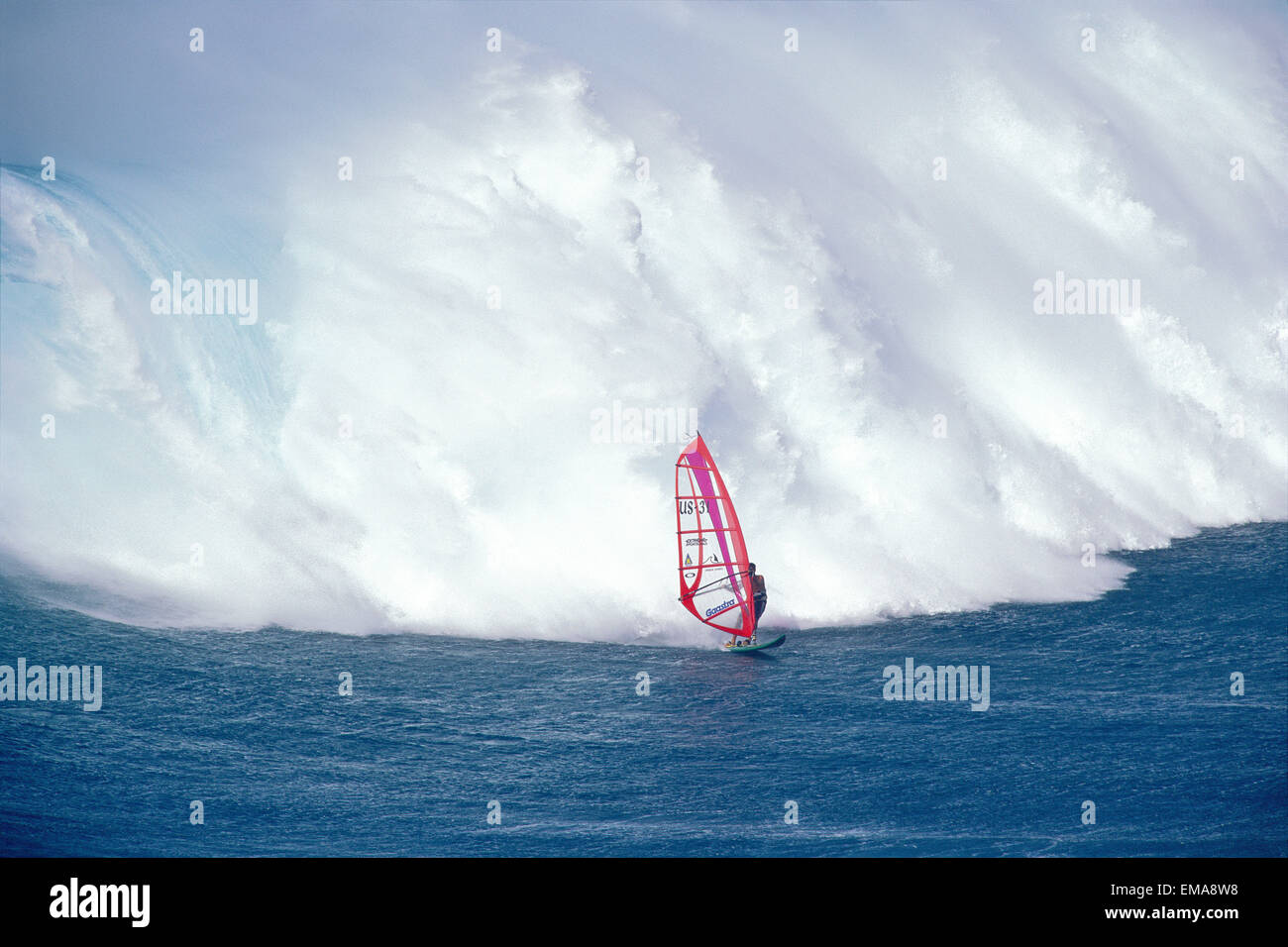 Hawaii, Maui, Jaws, Huge Wave Crashing Behind A Windsurfer Stock Photo ...