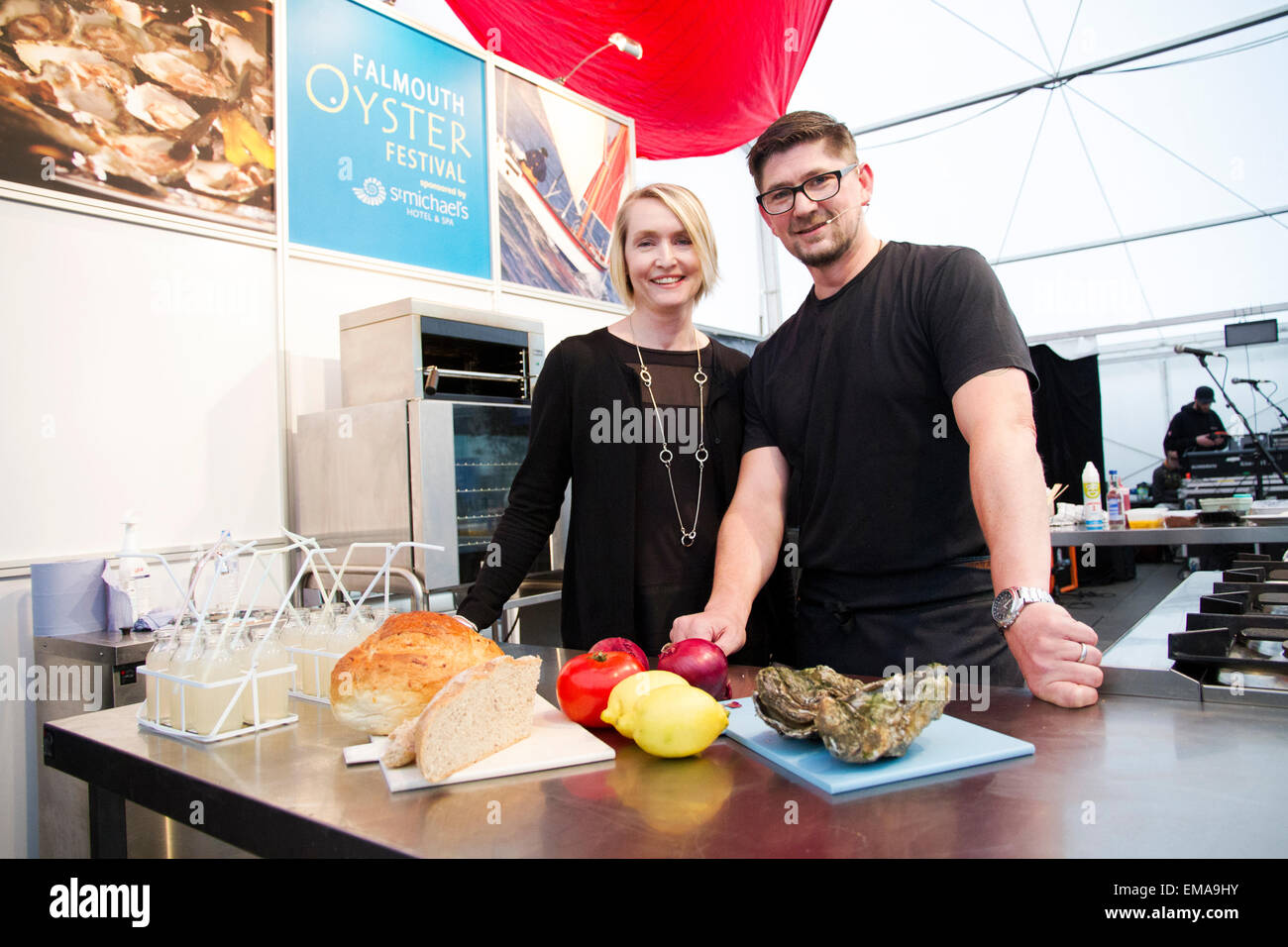 Nick Hodges, head Chef of Fire Kitchen, and his wife (centre) prepare ...